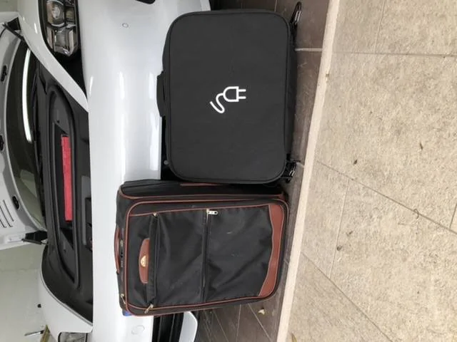 Storage questions: charging cable in trunk or frunk? Bag options for ...