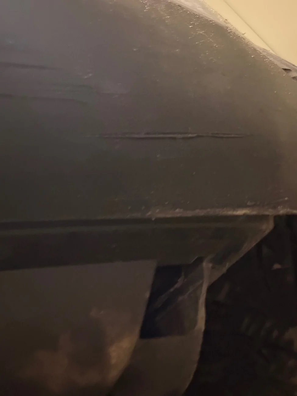 Should I fix this scratch under front bumper or leave it? | TaycanForum ...